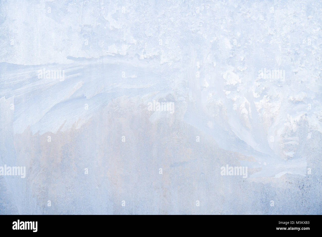 Winter frosty patterns on the frozen ice window Stock Photo - Alamy