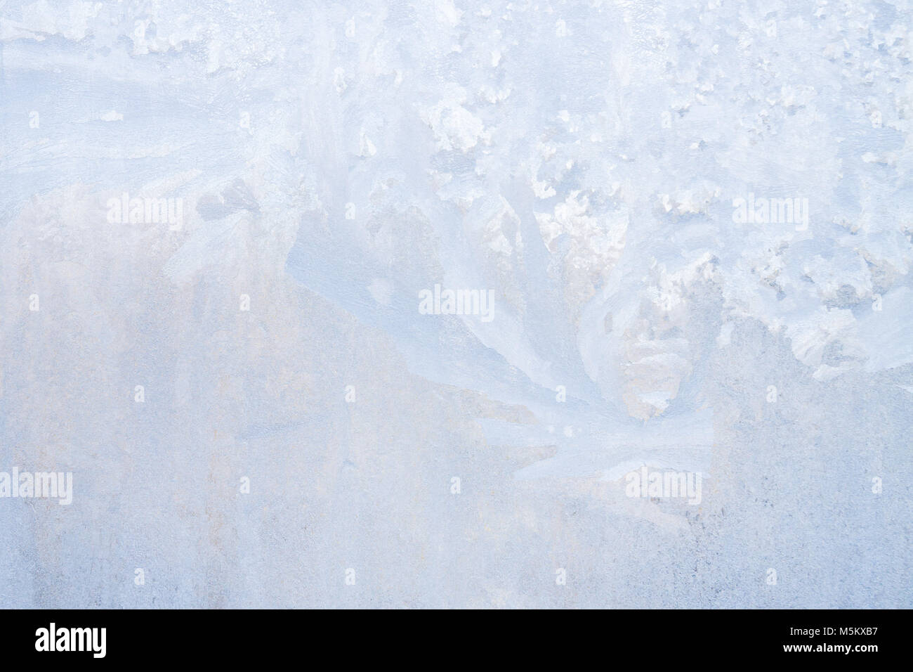 Winter frosty patterns on the frozen ice window Stock Photo - Alamy