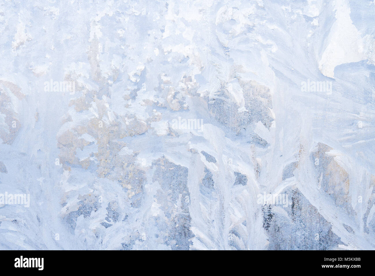 Winter frosty patterns on the frozen ice window Stock Photo - Alamy