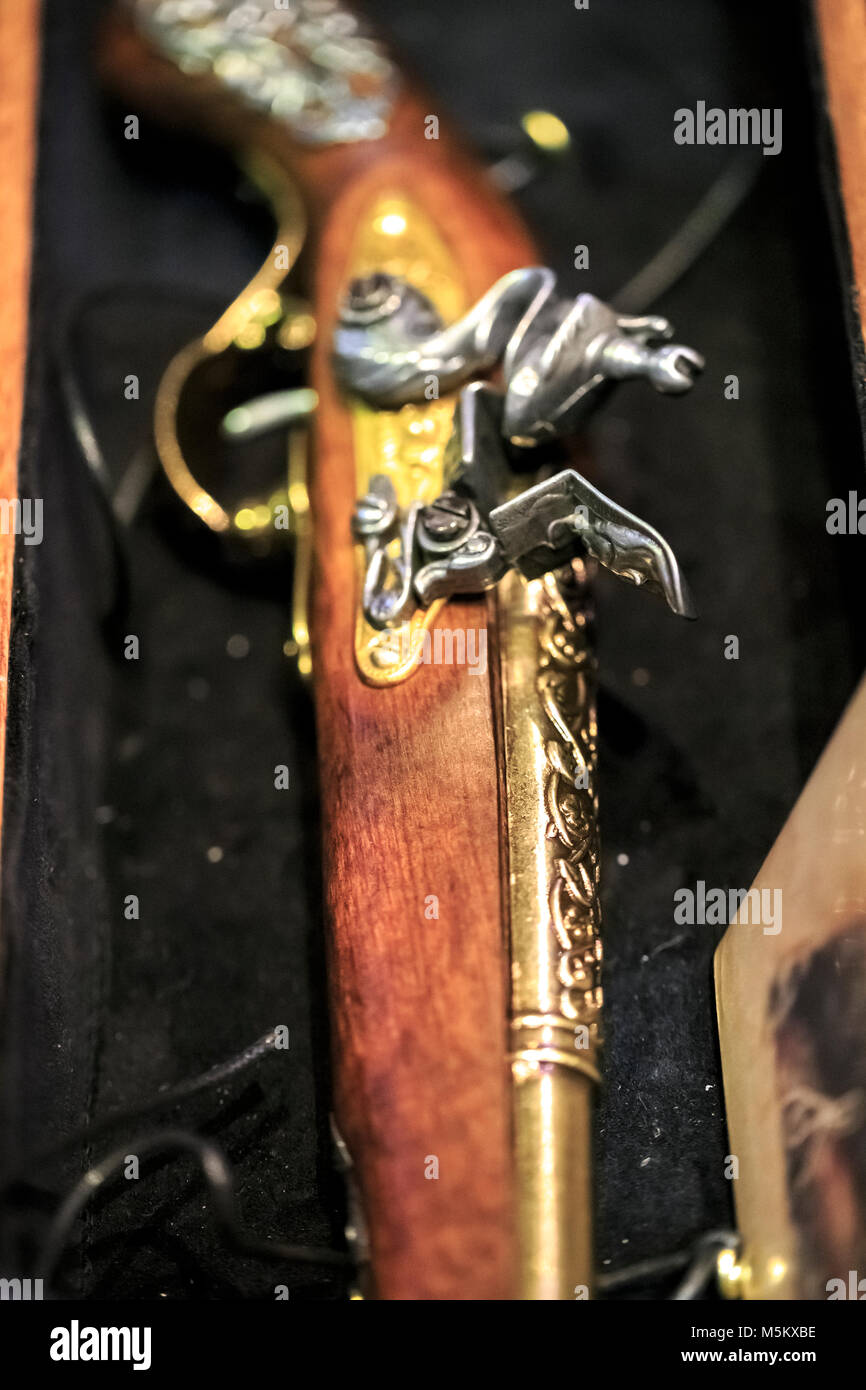 Antique pirate gun on a box Stock Photo - Alamy