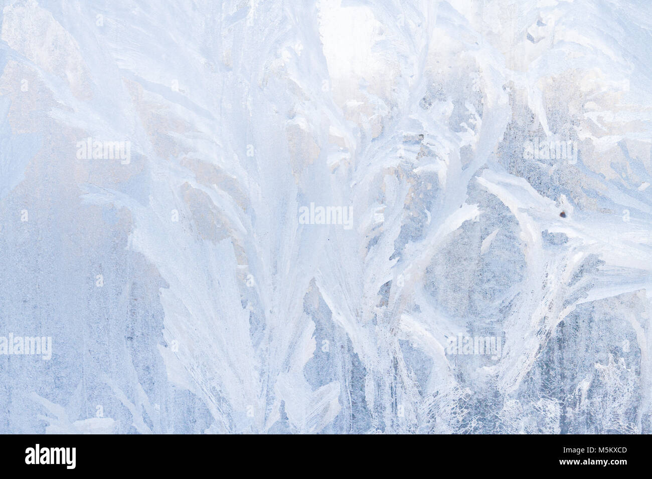 Winter frosty patterns on the frozen ice window Stock Photo - Alamy
