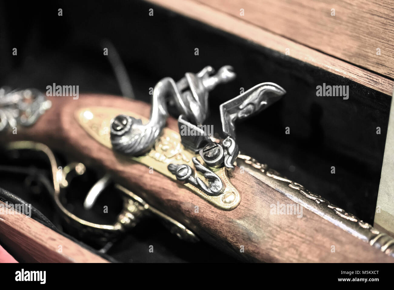 Antique pirate gun on a box Stock Photo - Alamy