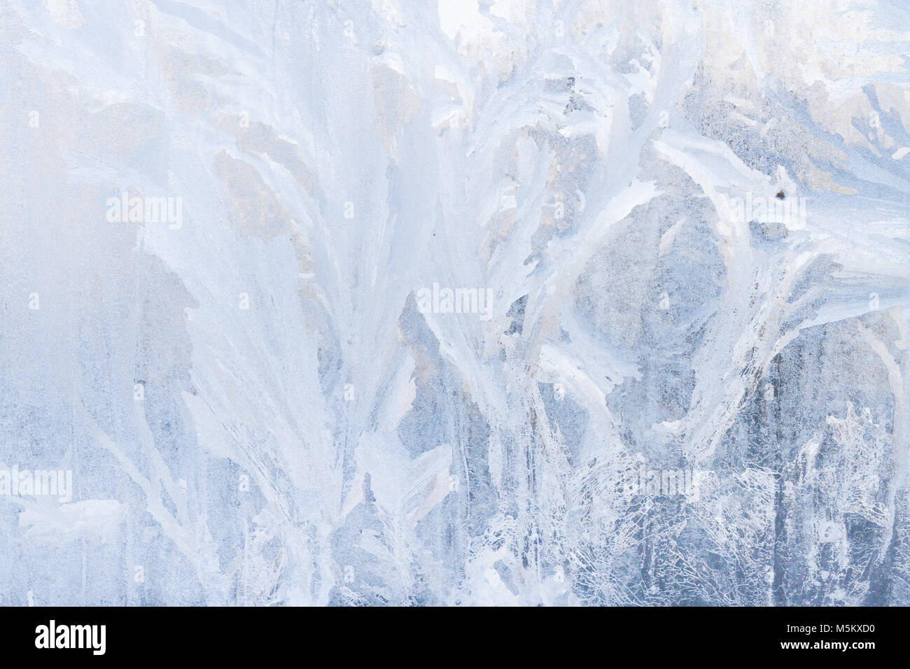 Winter frosty patterns on the frozen ice window Stock Photo - Alamy