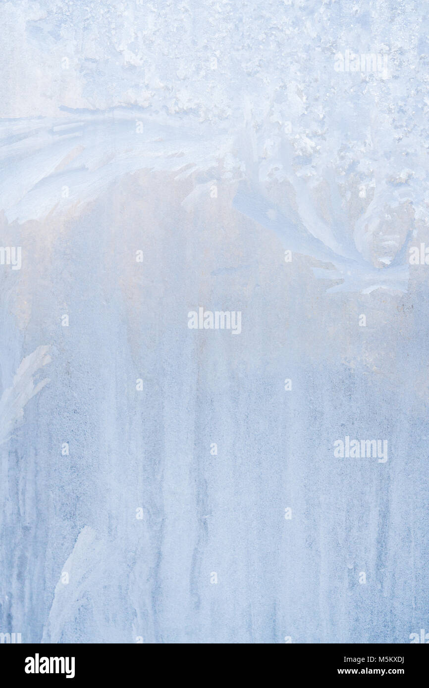 Winter frosty patterns on the frozen ice window Stock Photo - Alamy