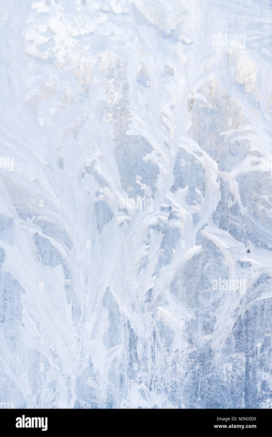 Winter frosty patterns on the frozen ice window Stock Photo - Alamy