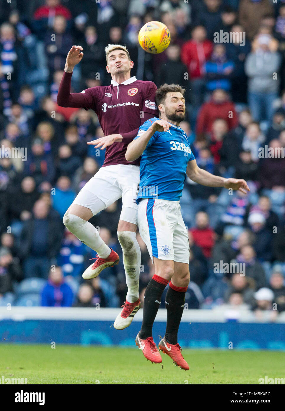 Rangers' Russell Martin (right) and Hearts' Kyle Lafferty (left) battle ...