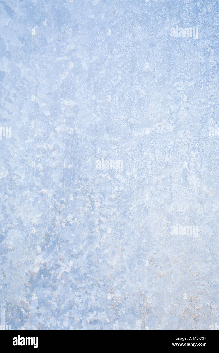 Winter frosty patterns on the frozen ice window Stock Photo - Alamy
