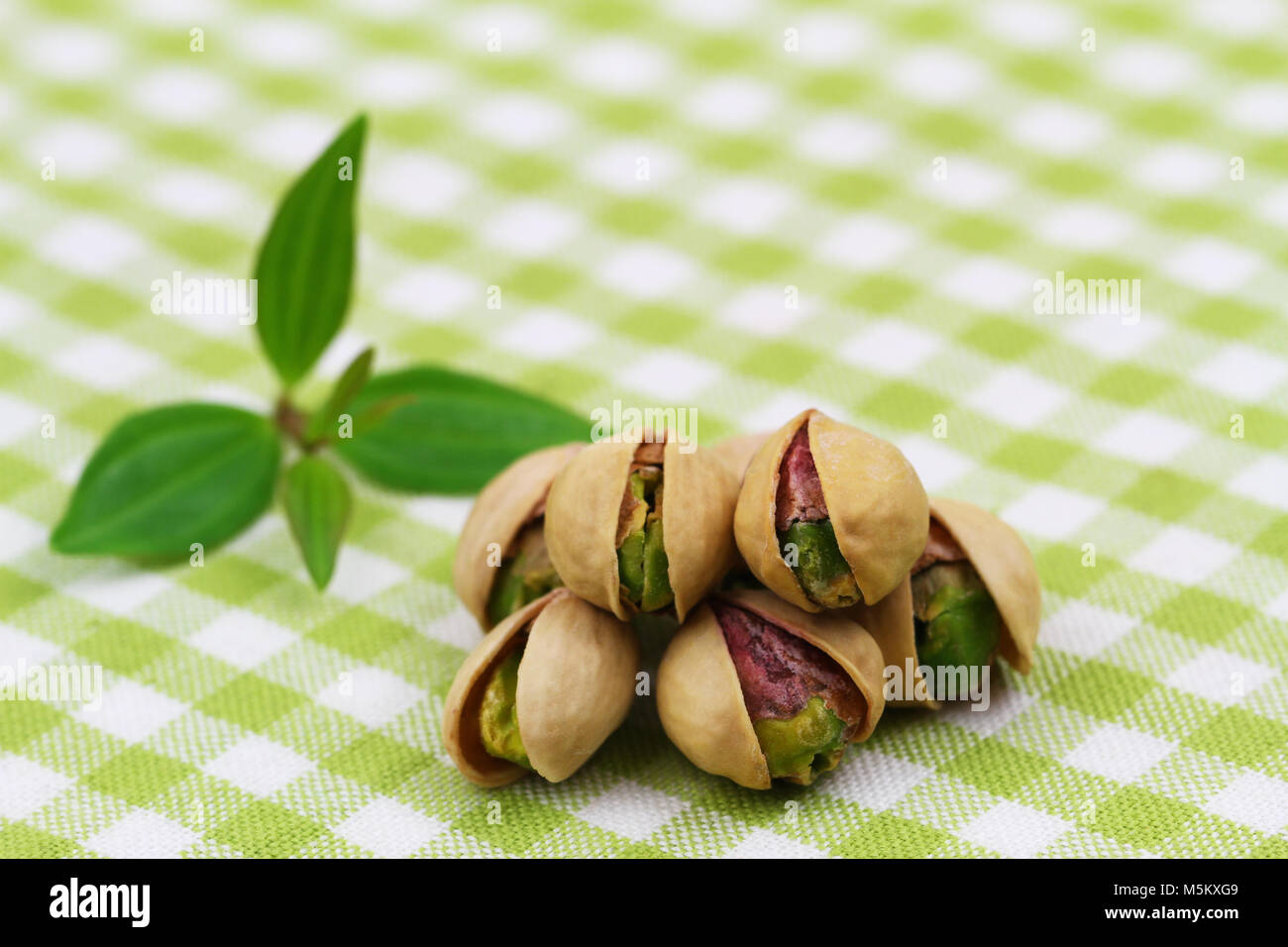 Pistachio nut with open nutshell hi-res stock photography and images ...