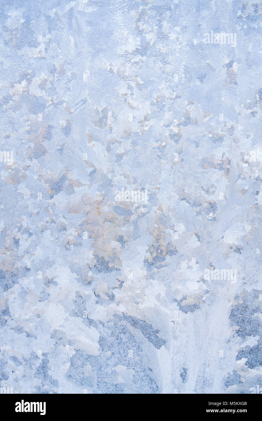 Winter frosty patterns on the frozen ice window Stock Photo - Alamy