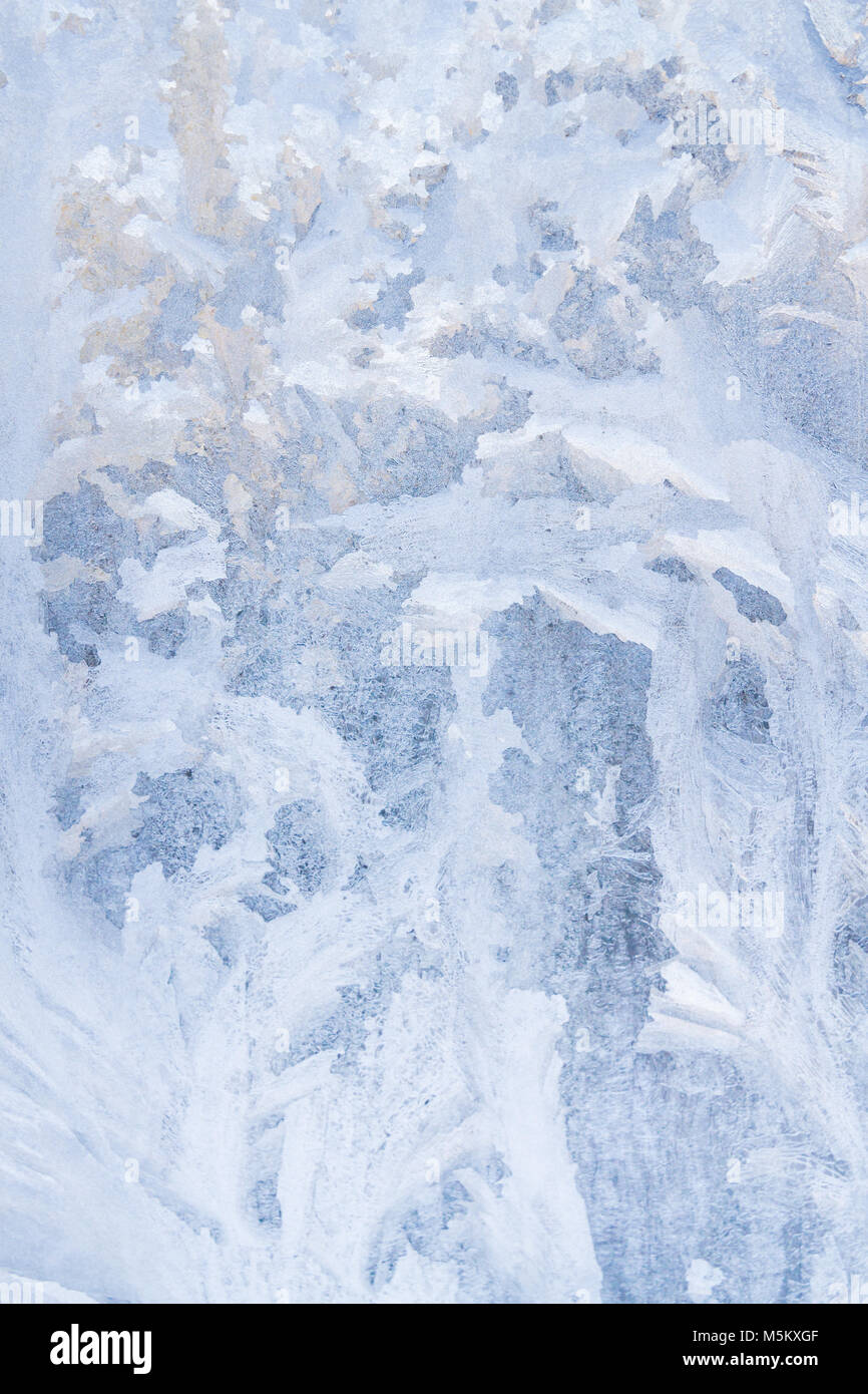 Winter frosty patterns on the frozen ice window Stock Photo - Alamy