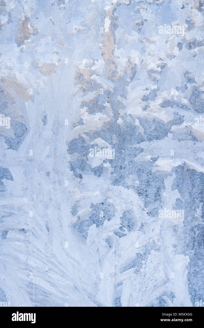 Winter frosty patterns on the frozen ice window Stock Photo - Alamy