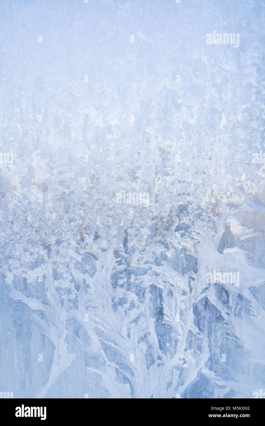 Winter frosty patterns on the frozen ice window Stock Photo - Alamy