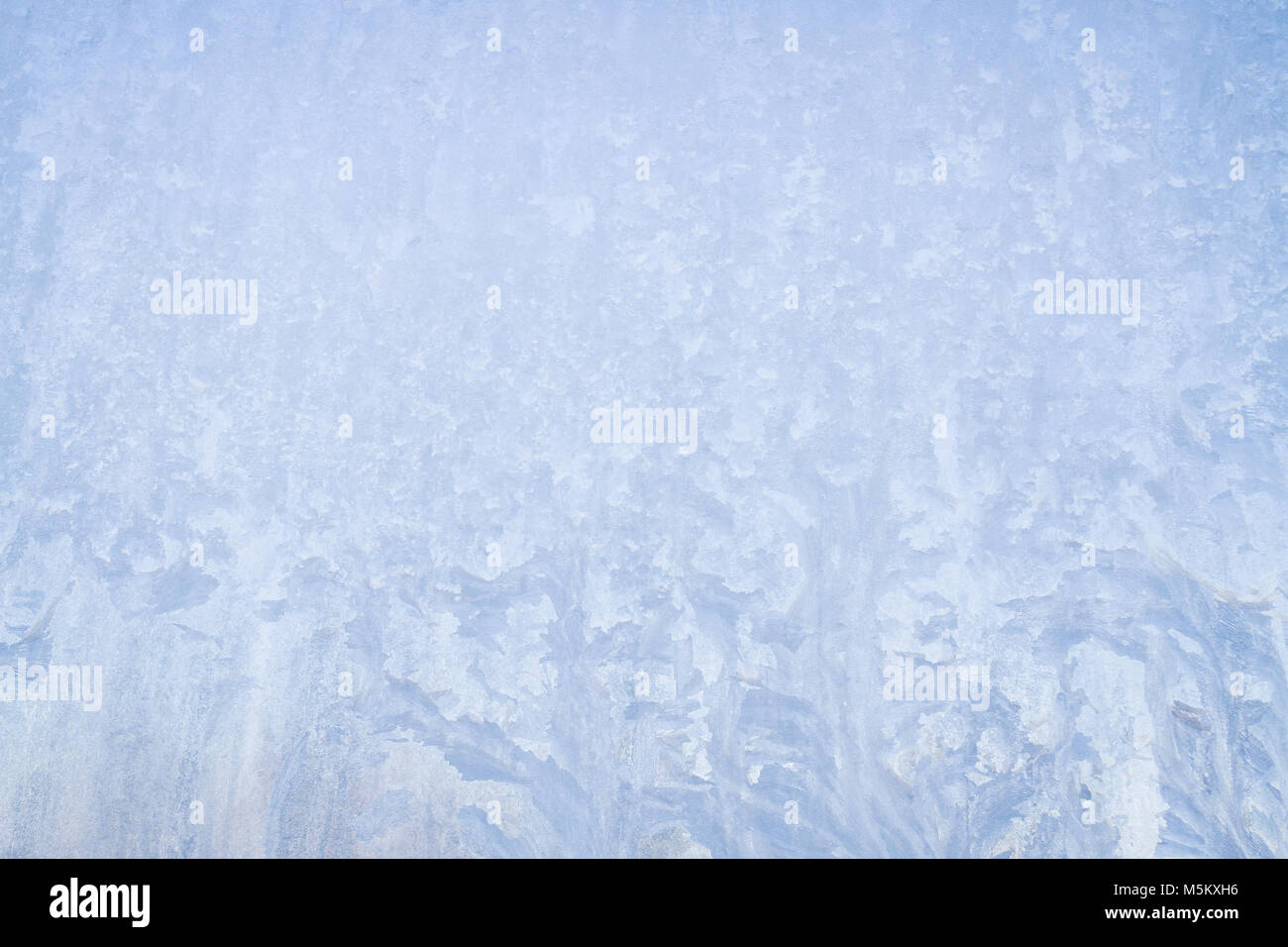 Winter frosty patterns on the frozen ice window Stock Photo - Alamy