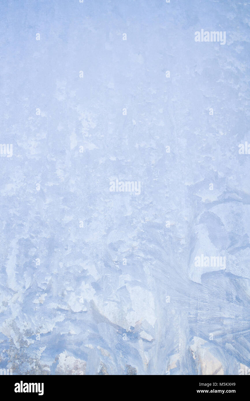 Winter frosty patterns on the frozen ice window Stock Photo - Alamy