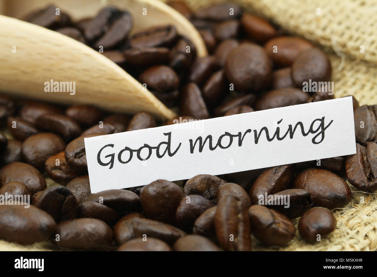 Good morning card with roasted coffee beans, closeup Stock Photo - Alamy