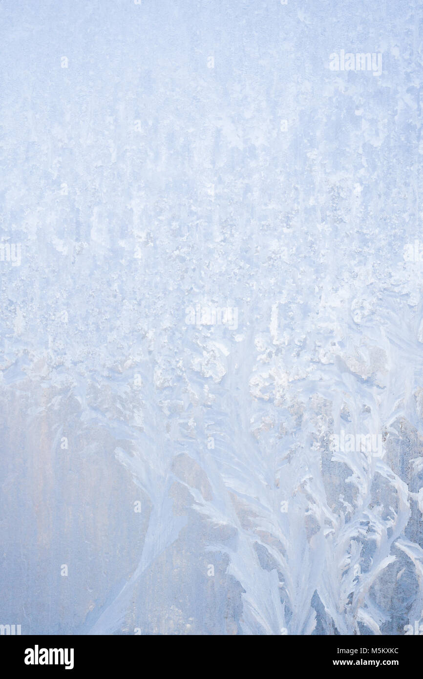 Winter frosty patterns on the frozen ice window Stock Photo - Alamy