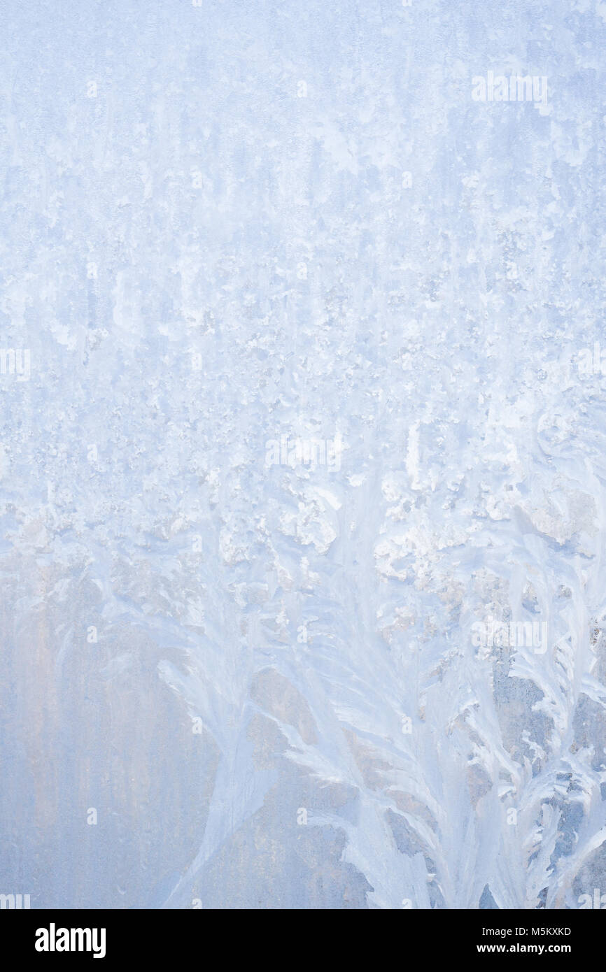 Winter frosty patterns on the frozen ice window Stock Photo - Alamy
