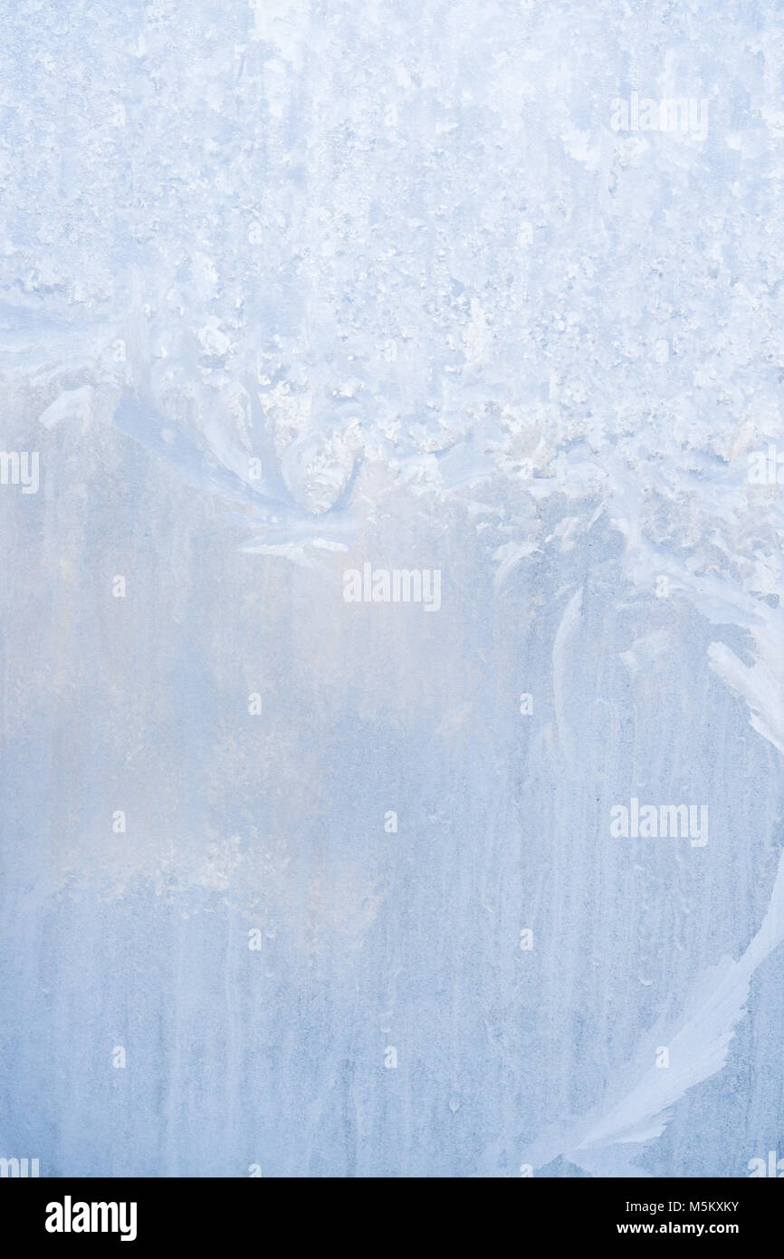 Winter frosty patterns on the frozen ice window Stock Photo - Alamy