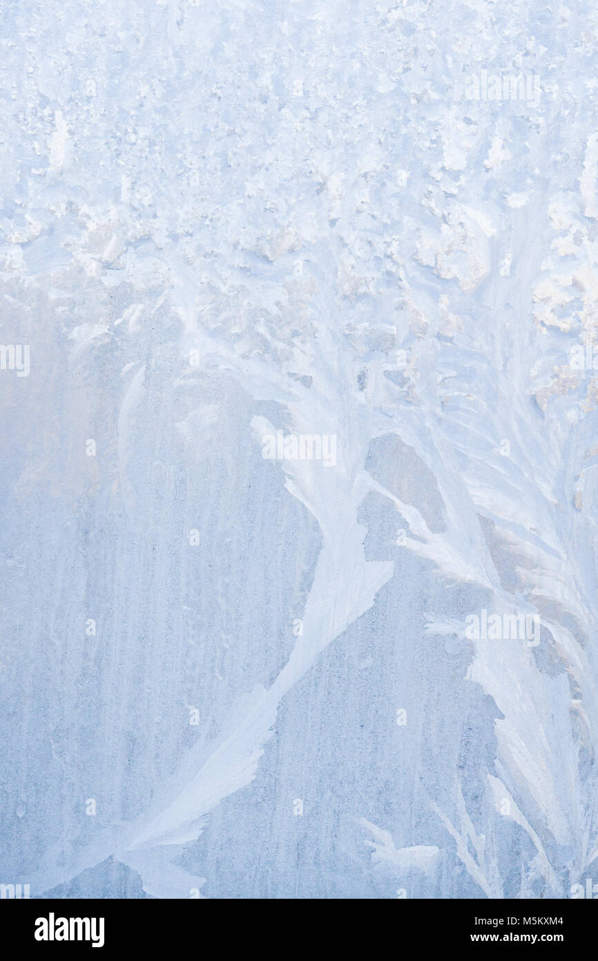 Winter frosty patterns on the frozen ice window Stock Photo - Alamy