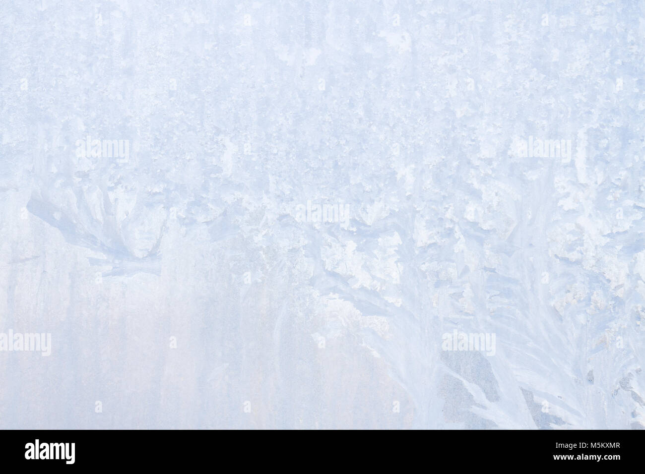 Winter frosty patterns on the frozen ice window Stock Photo - Alamy