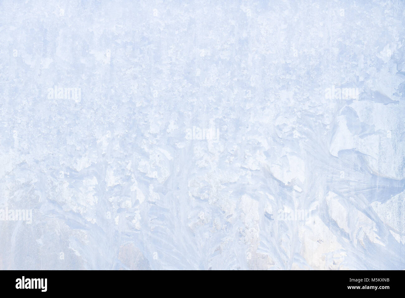 Winter frosty patterns on the frozen ice window Stock Photo - Alamy