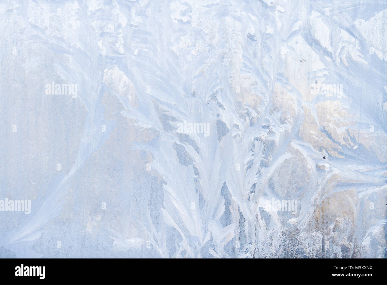 Winter frosty patterns on the frozen ice window Stock Photo - Alamy
