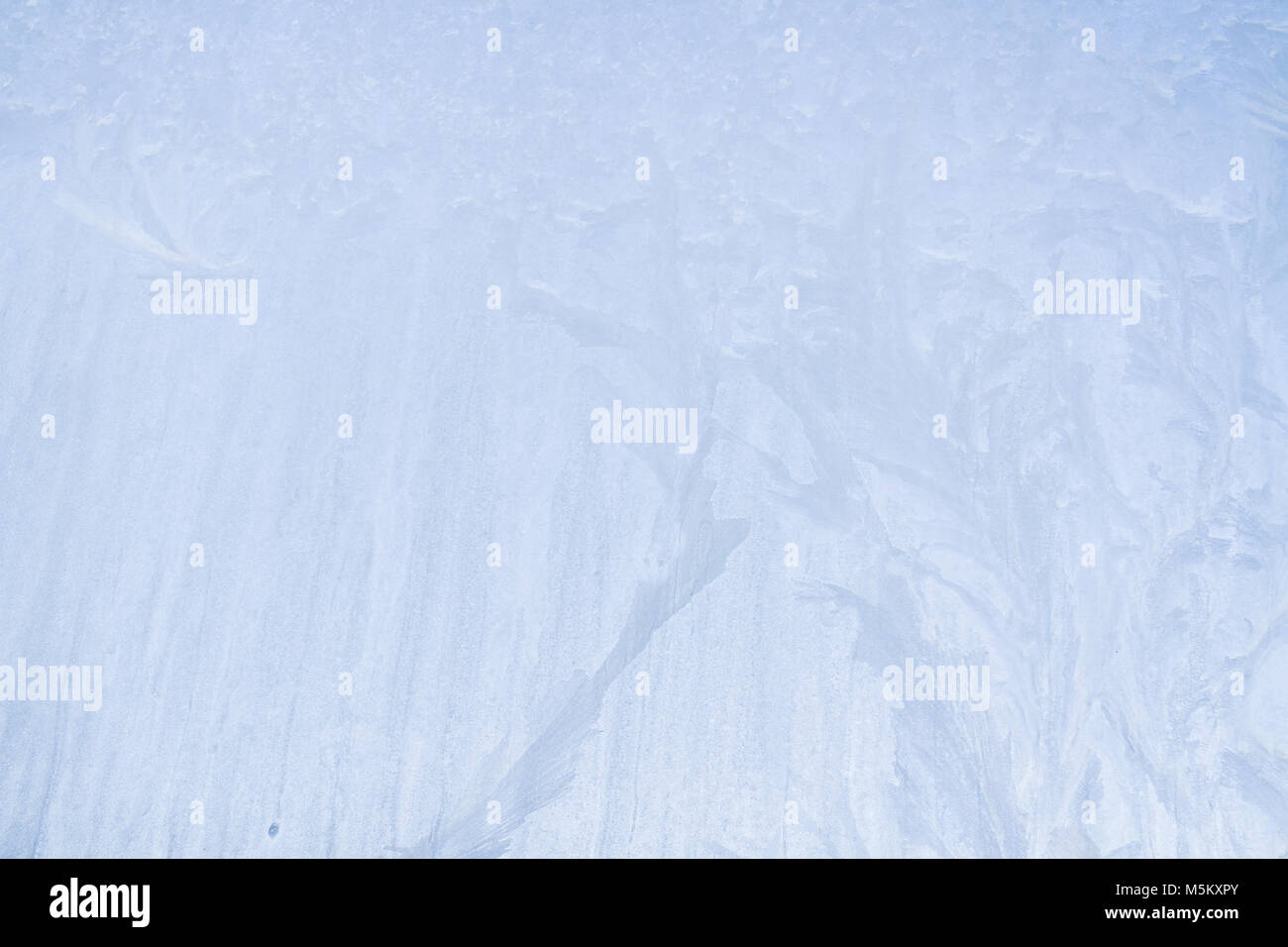 Winter frosty patterns on the frozen ice window Stock Photo - Alamy