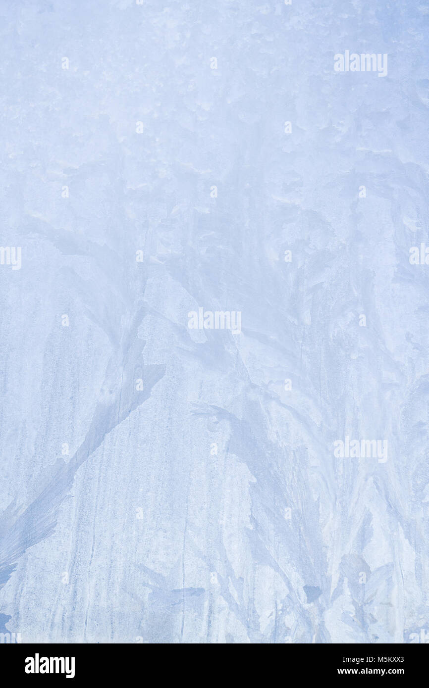 Winter frosty patterns on the frozen ice window Stock Photo - Alamy