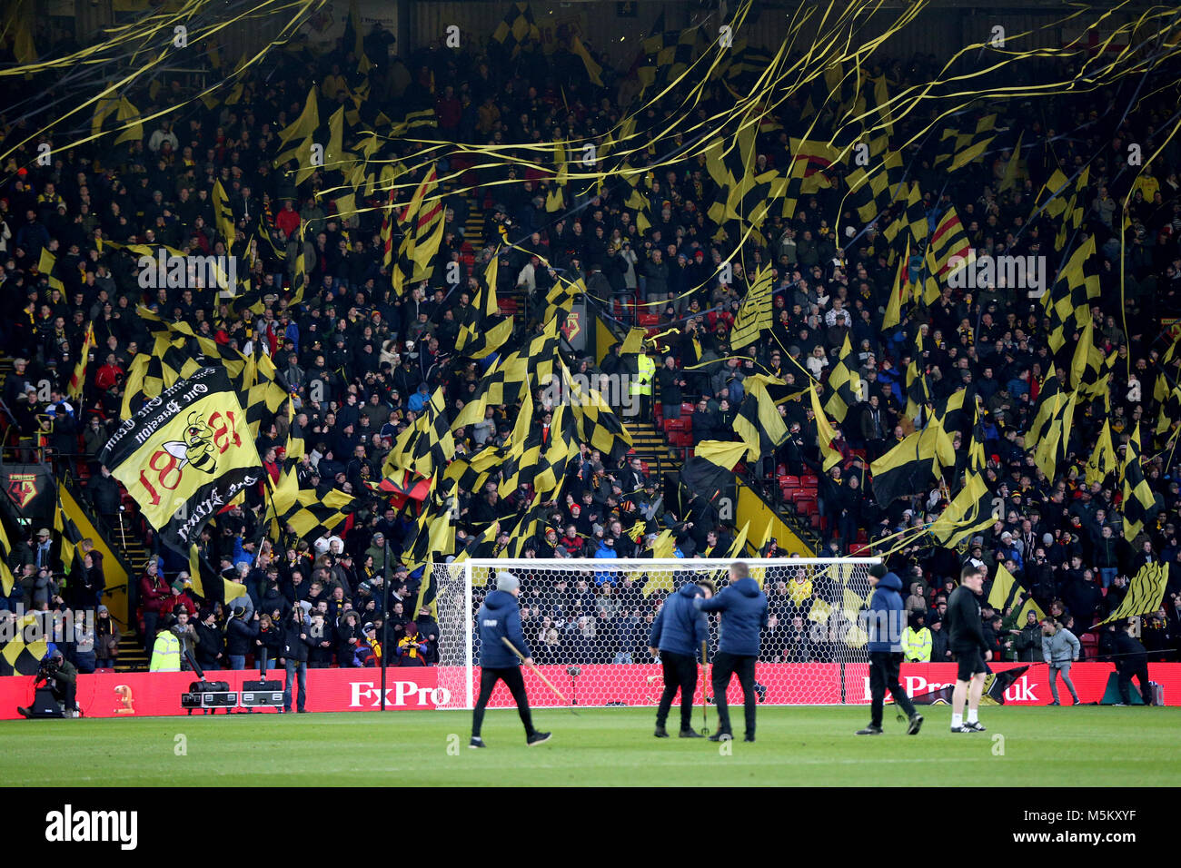 Watford fans wave banners and flags to show their support during the ...