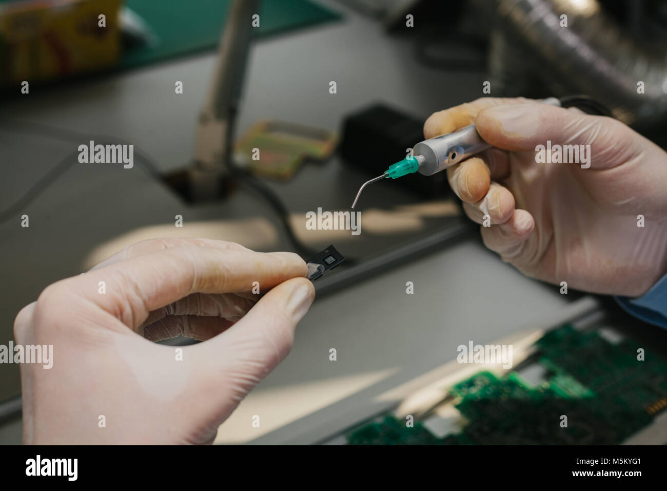 The assembly of computer units. Technological process Stock Photo - Alamy