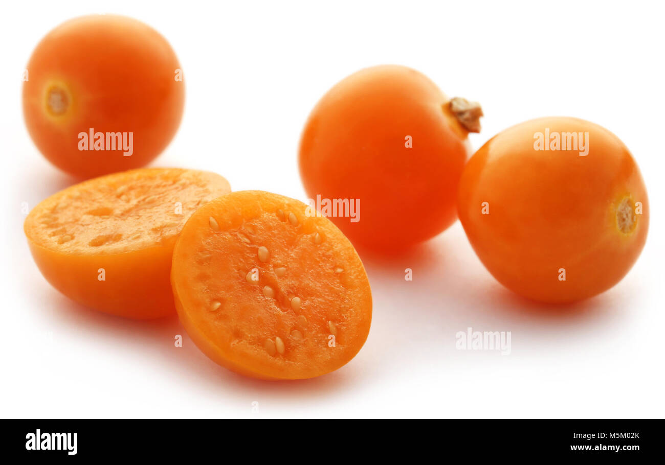 Fresh edible physalis over white background Stock Photo - Alamy