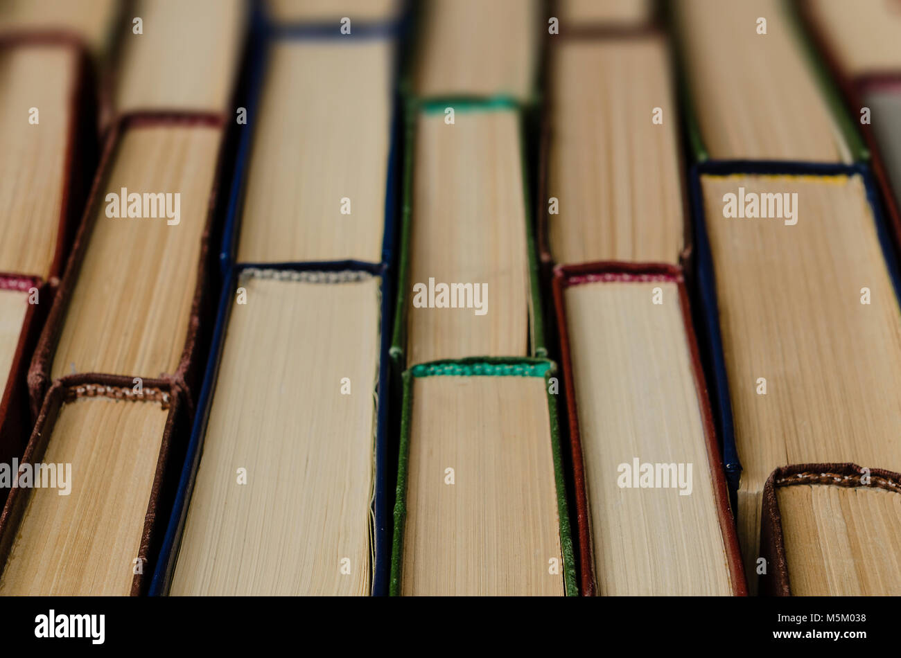 Many old books, top view, like background. The concept of education. A ...