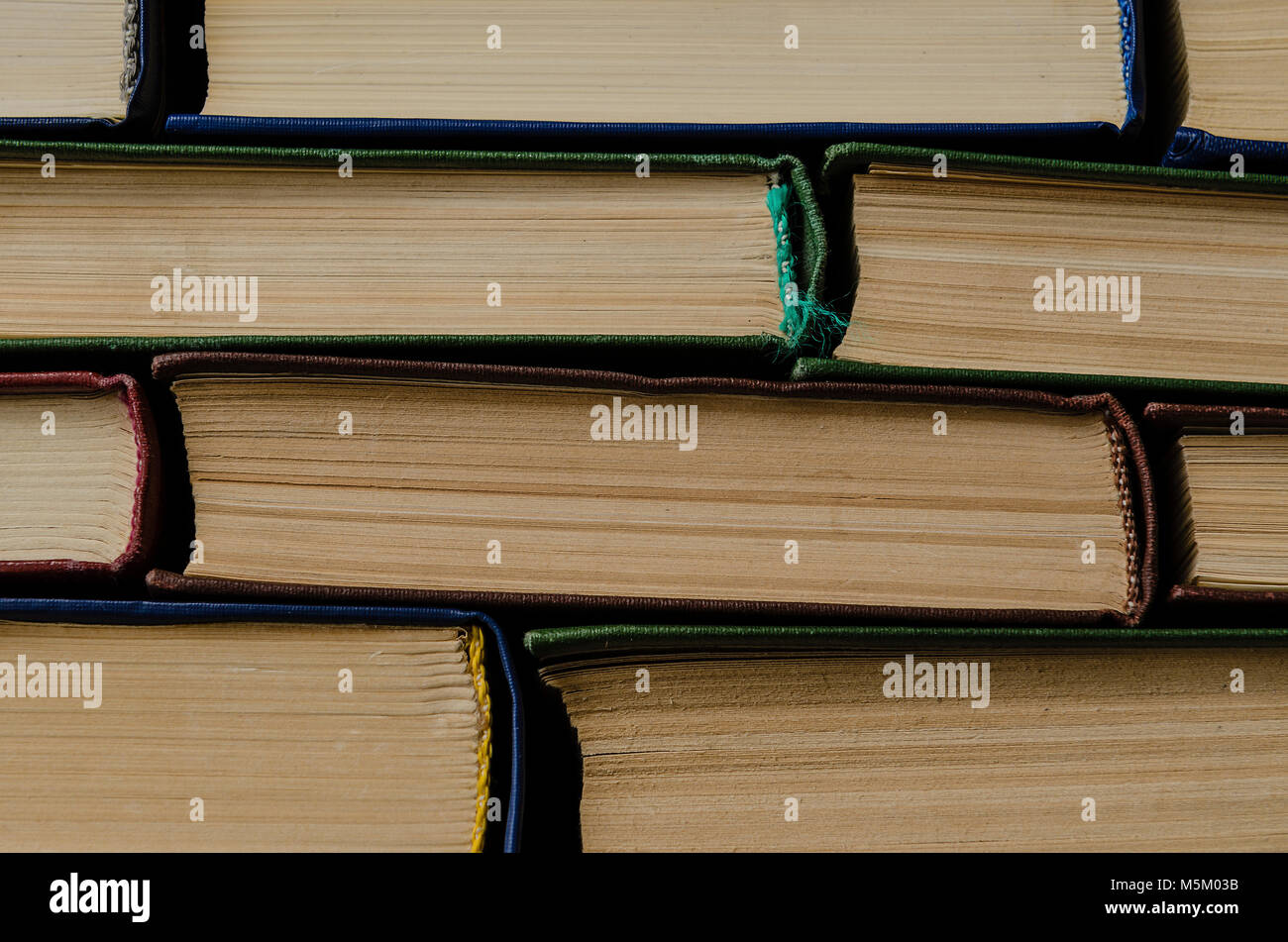 Many old books, top view, like background. The concept of education. A ...