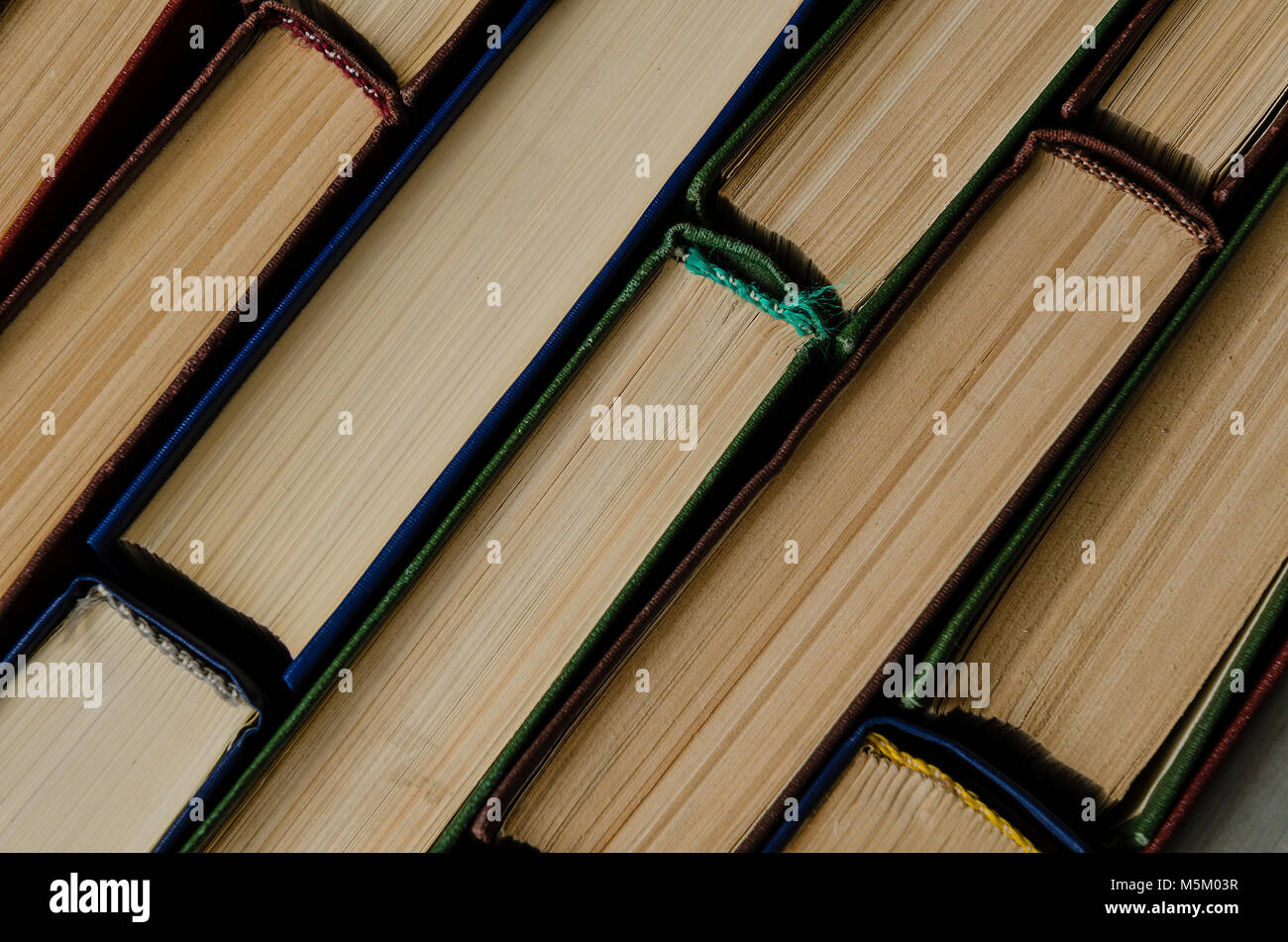 Many old books, top view, like background. The concept of education. A ...