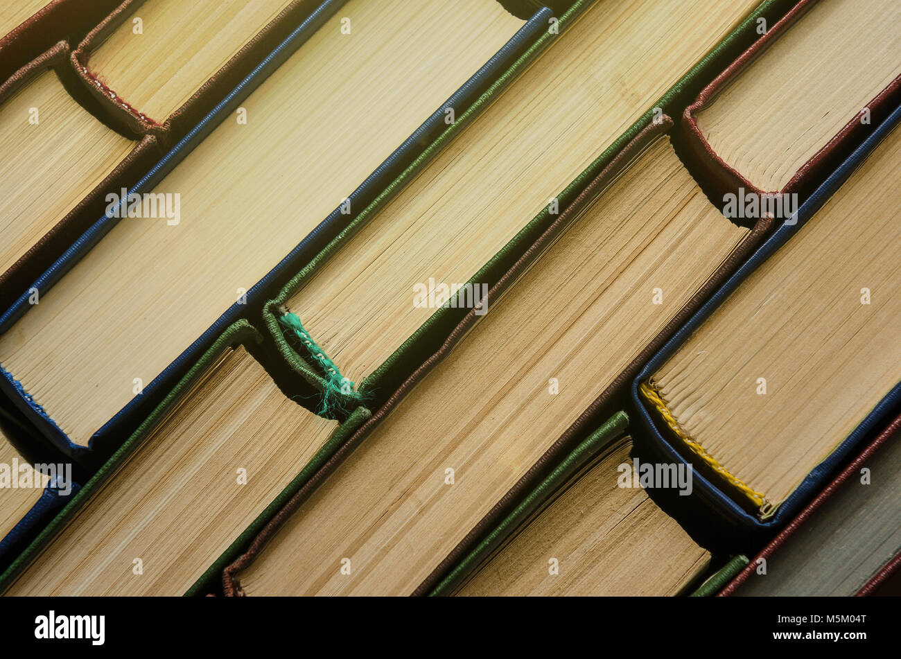Many old books, top view, like background. The concept of education. A ...