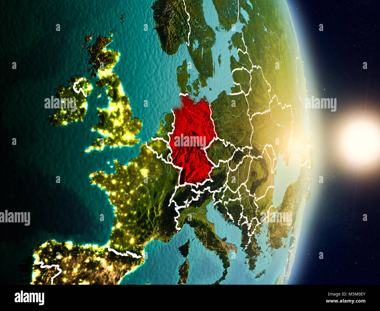 Germany during sunrise highlighted in red on planet Earth with visible ...