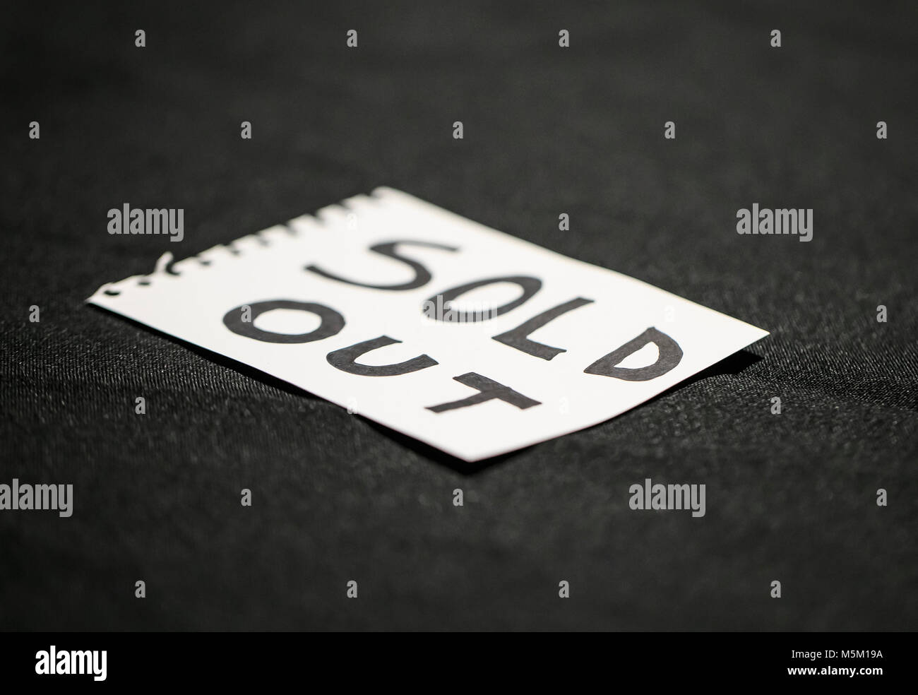 Sold out sign in a paper Stock Photo - Alamy