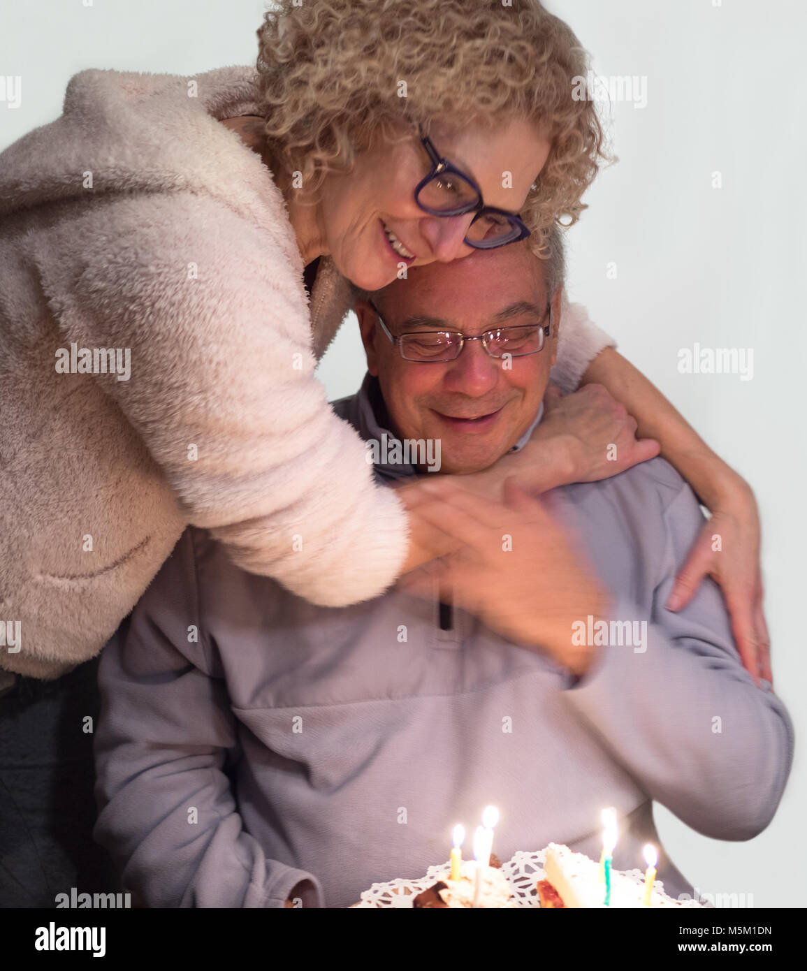 Two friends hugging and celebrating a birthday Stock Photo - Alamy