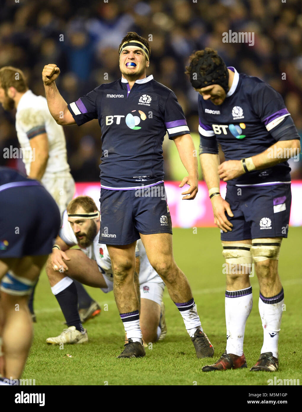 Scotland's Stuart McInally ( centre) and Scotland's Tim Swinson ...