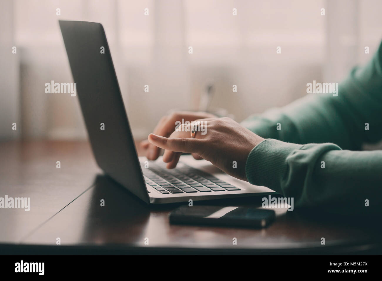 Man hands working on laptop Stock Photo - Alamy