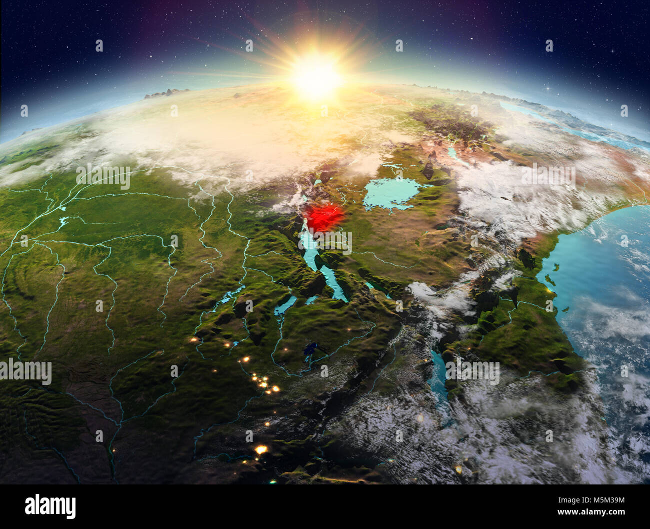 Satellite view of Burundi highlighted in red on planet Earth with clouds during sunrise. 3D ...