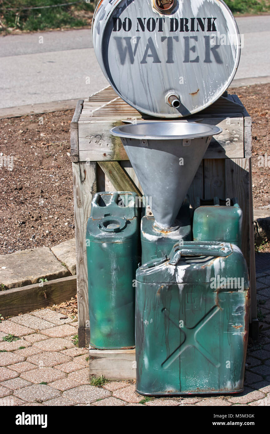 cans/barrel used for holding water Stock Photo - Alamy