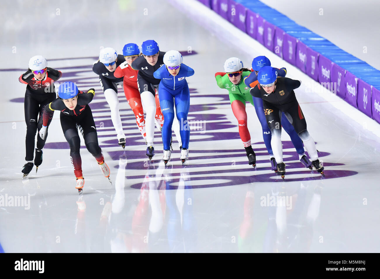 German speed skater Claudia Pechstein (R) skates at the Gangneung Oval ...