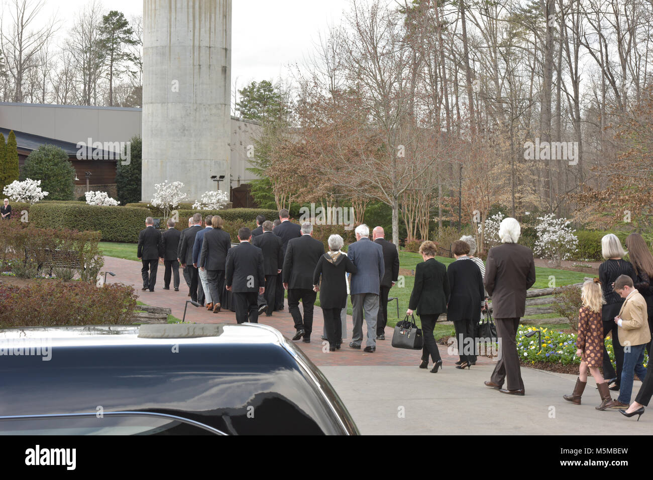 Charlotte, NC, USA. 24 Feb. 2018. Family members gather to receive the ...