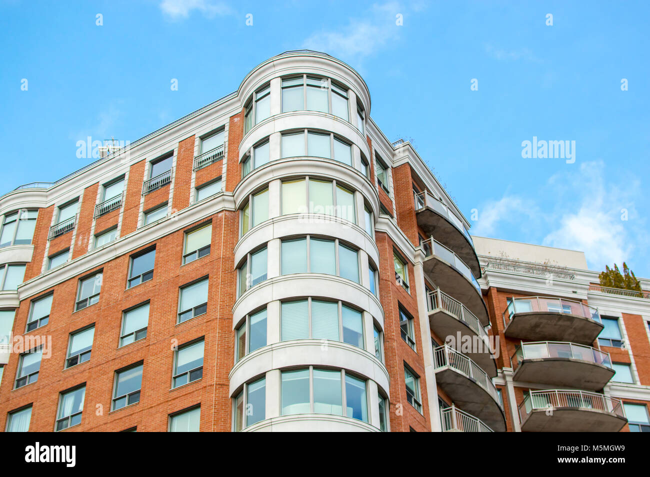 Modern condo buildings with huge windows and balconies in Montreal ...