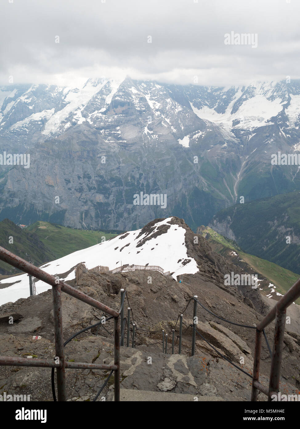 Path down the mountains at Schilthorn Stock Photo - Alamy