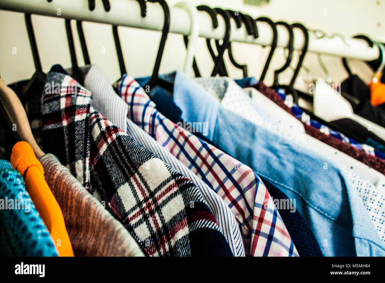 row of shirts - stripes garment collection textile style Stock Photo ...