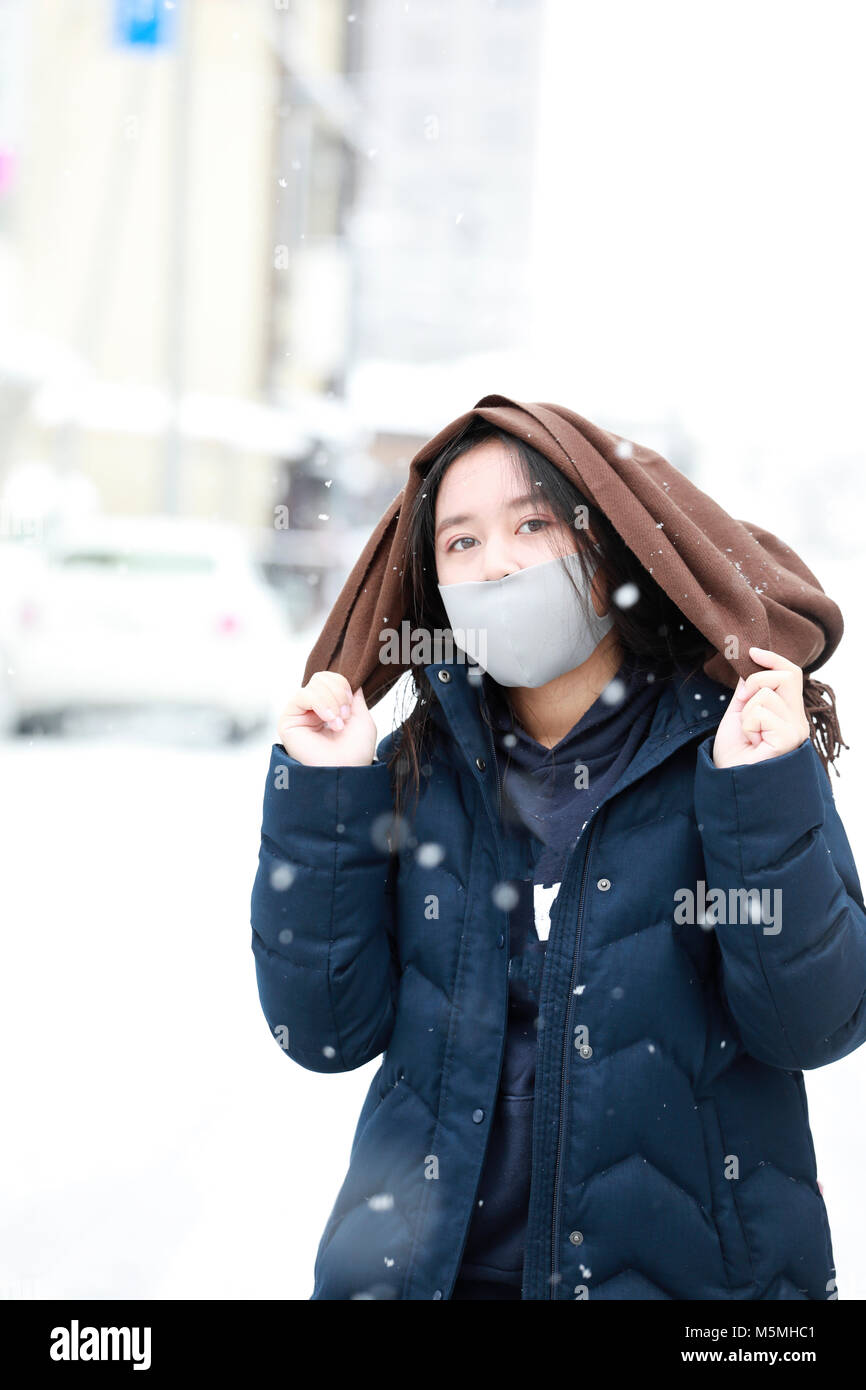 girl teenage on the snow day enjoying herself on a cold winter day in ...