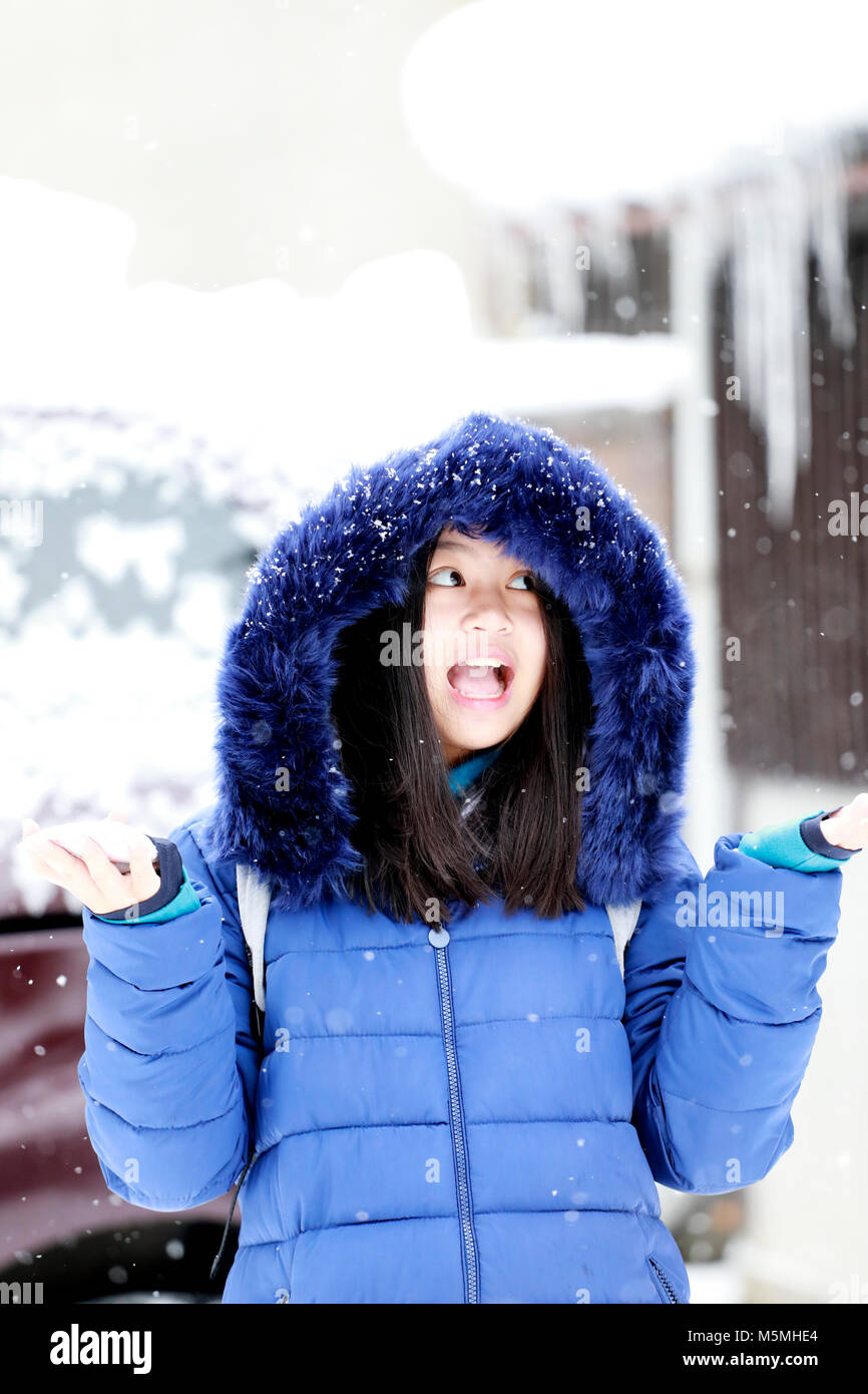 girl enjoy on the snow in the winter walk in nature Stock Photo - Alamy