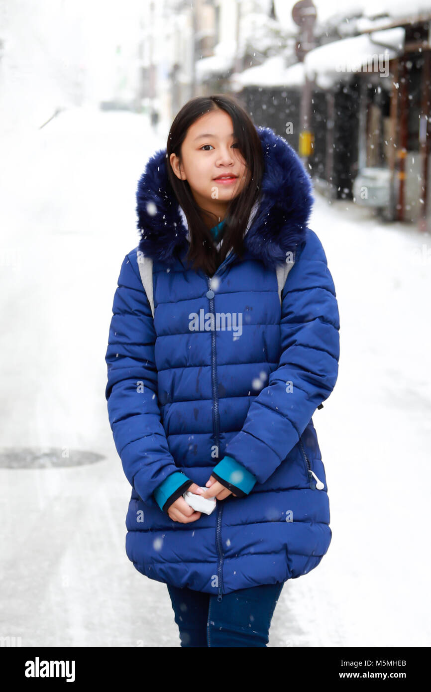 girl enjoy on the snow in the winter walk in nature Stock Photo - Alamy